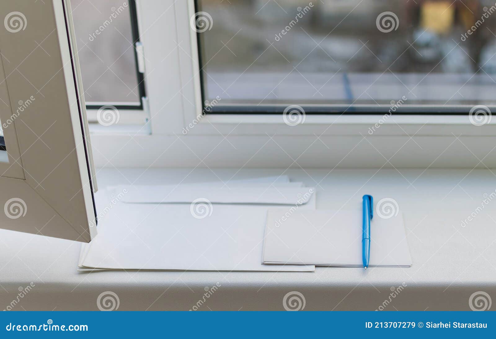 A Letter Envelope and a Pen on the Windowsill Stock Image - Image of ...