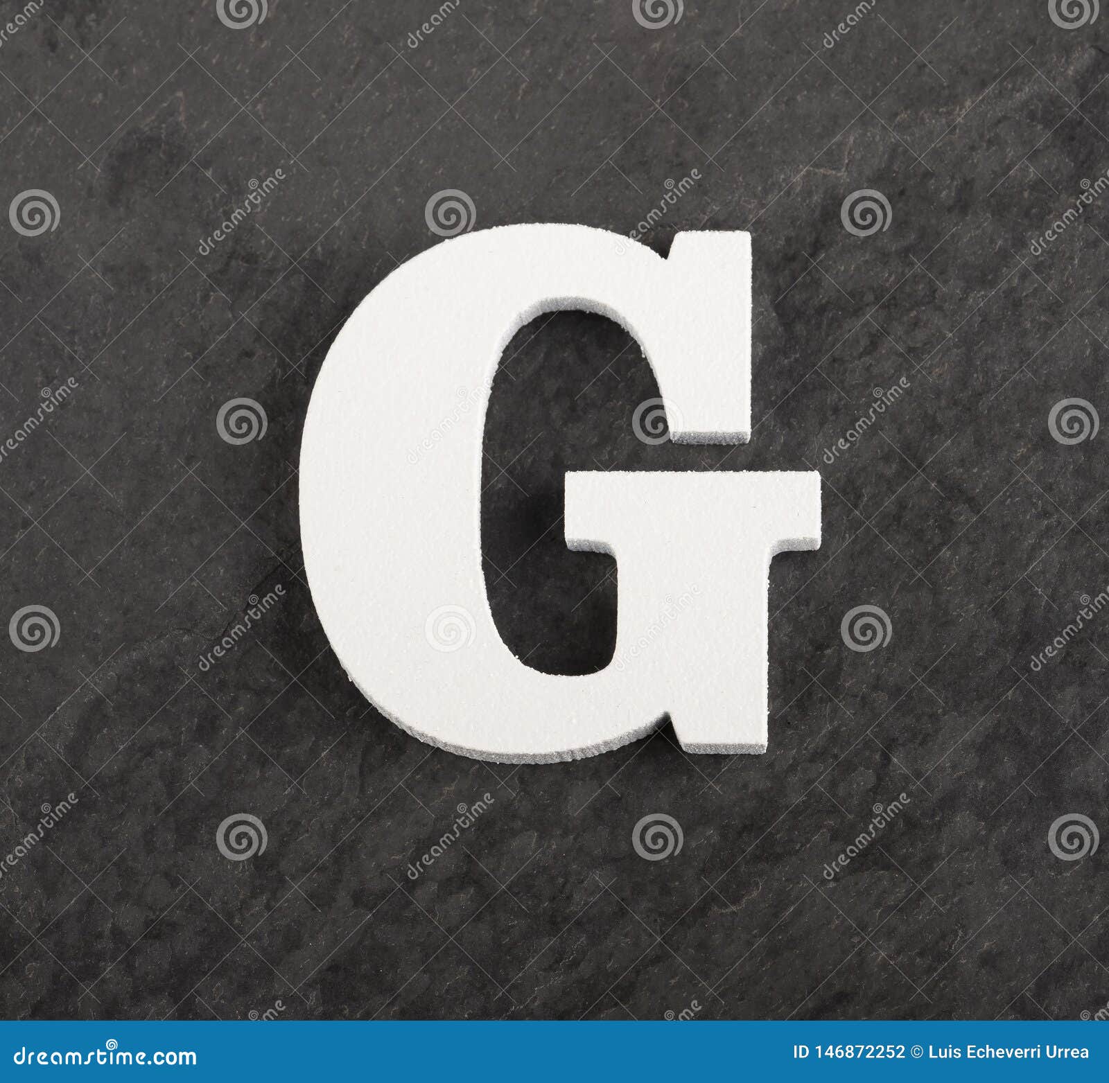 Letter G from Blank Alphabet on Gray Background - Top View Stock ...