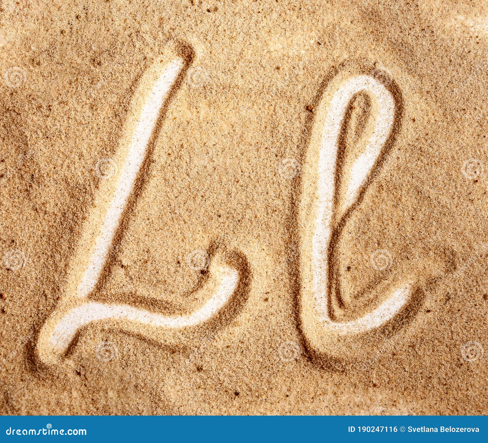 Letter L. English Handwritten Alphabet in the Sand Stock Photo - Image ...