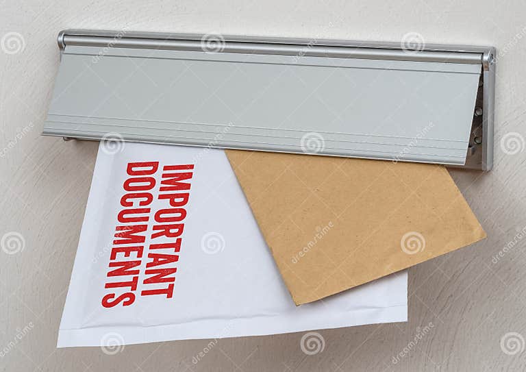 A Letter Labeled Important Documents in a Mail Slot Stock Image - Image ...