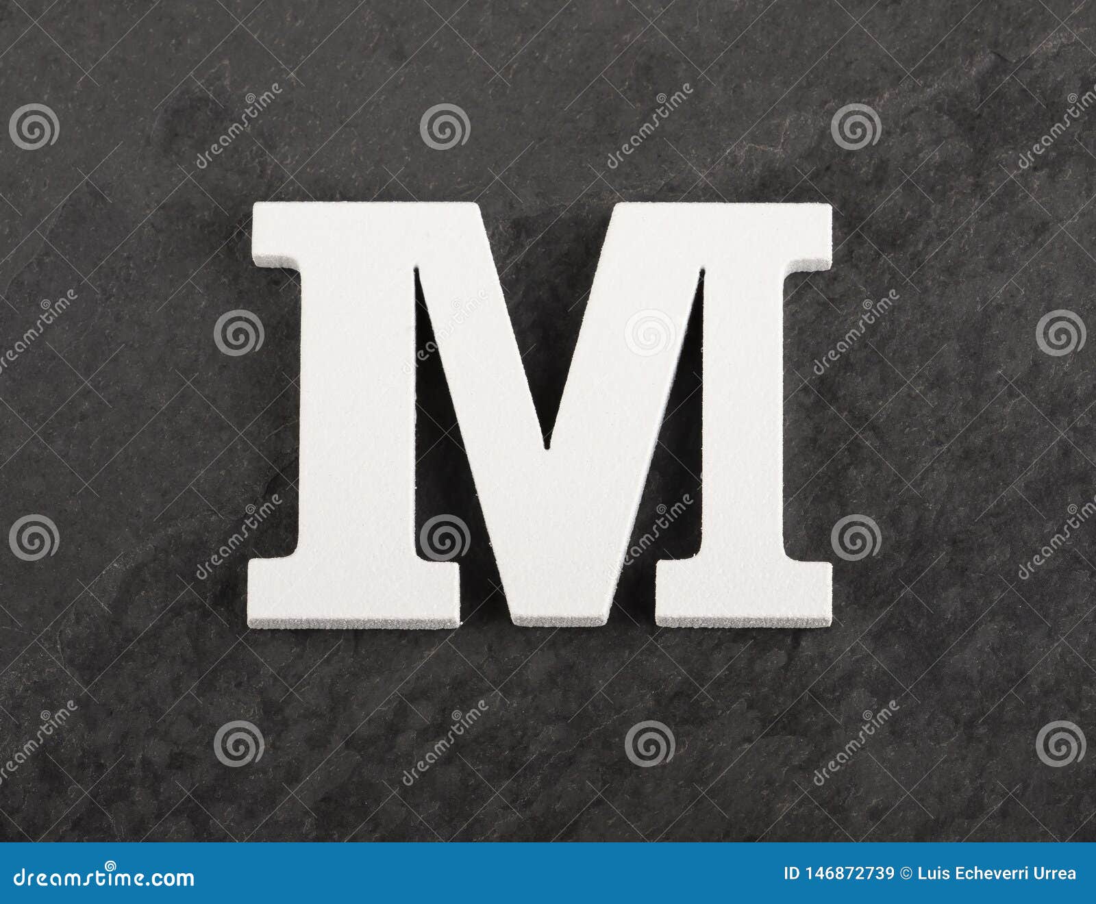 Letter M from Blank Alphabet on Gray Background - Top View Stock ...