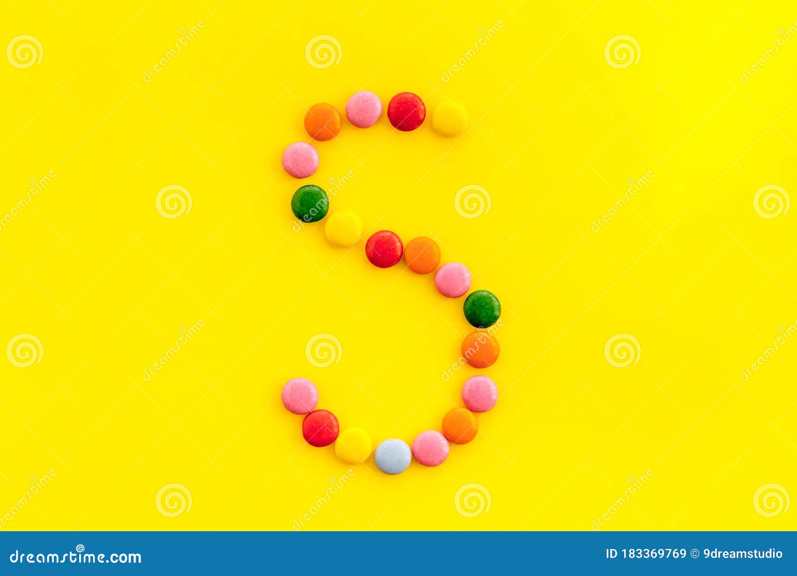 Letter S - Alphabet Made with Sweets on Yellow from Above Stock Image ...