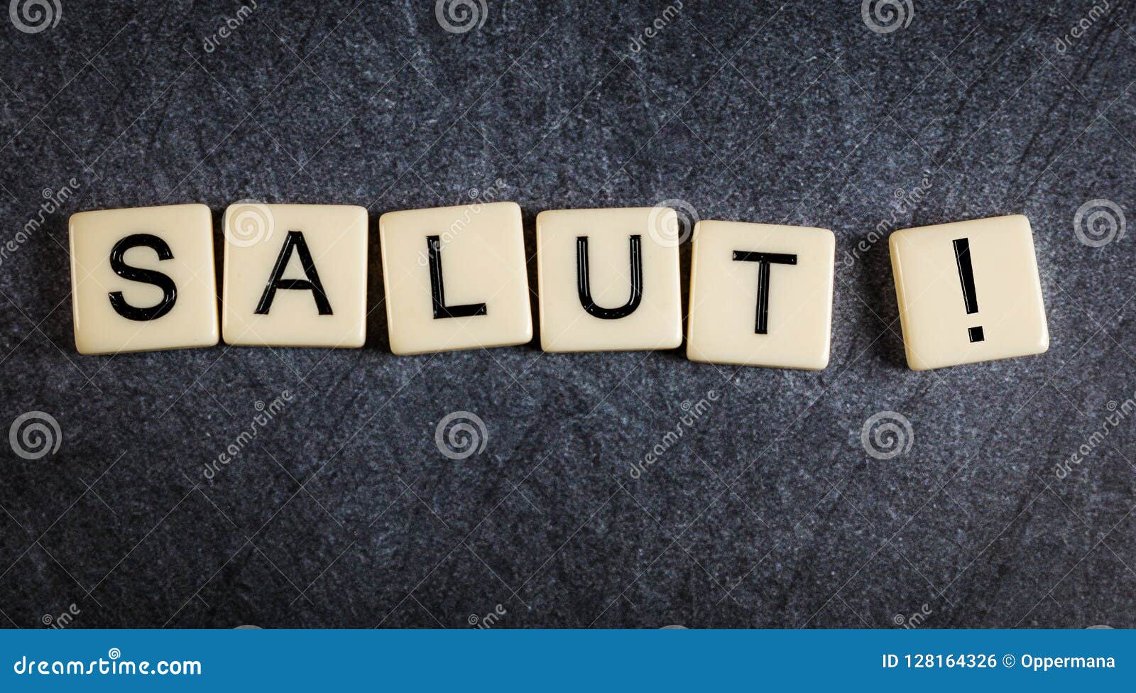 Letter Tiles on Black Slate Background Spelling Salut! Stock Photo ...