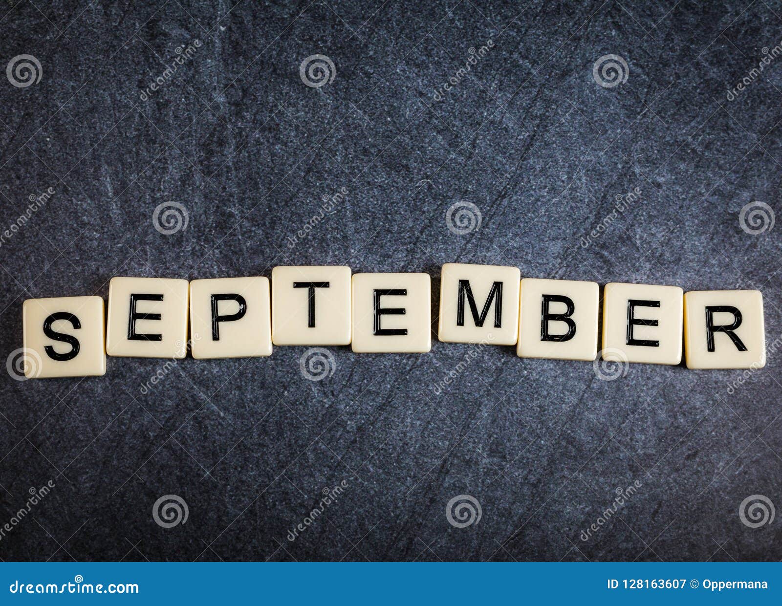 Letter Tiles on Black Slate Background Spelling September Stock Image ...