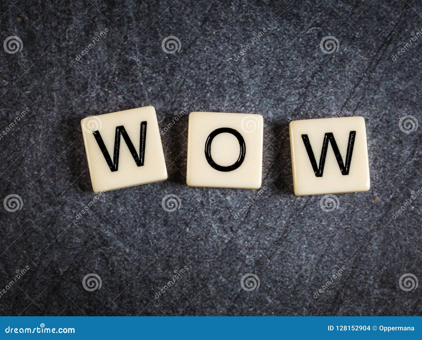 Letter Tiles on Black Slate Background Spelling Wow Stock Photo - Image ...