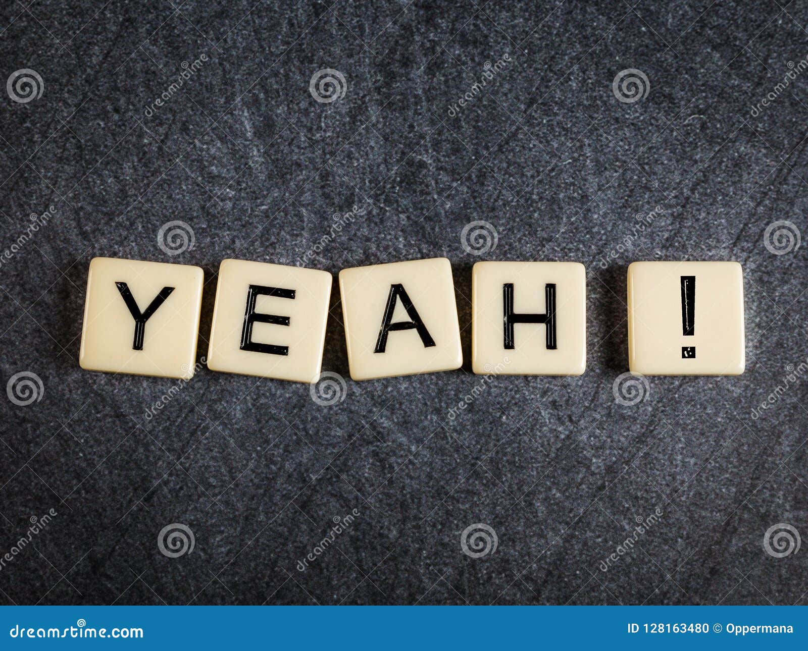 Letter Tiles on Black Slate Background Spelling Yeah! Stock Photo ...