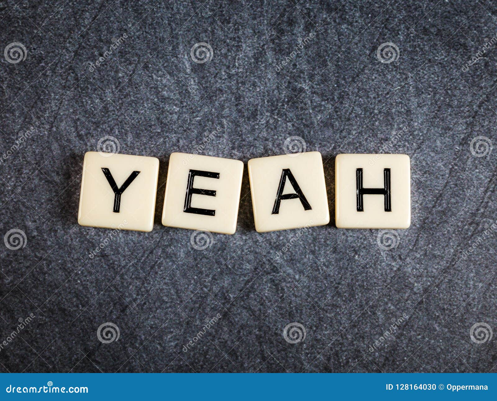 Letter Tiles on Black Slate Background Spelling Yeah Stock Photo ...
