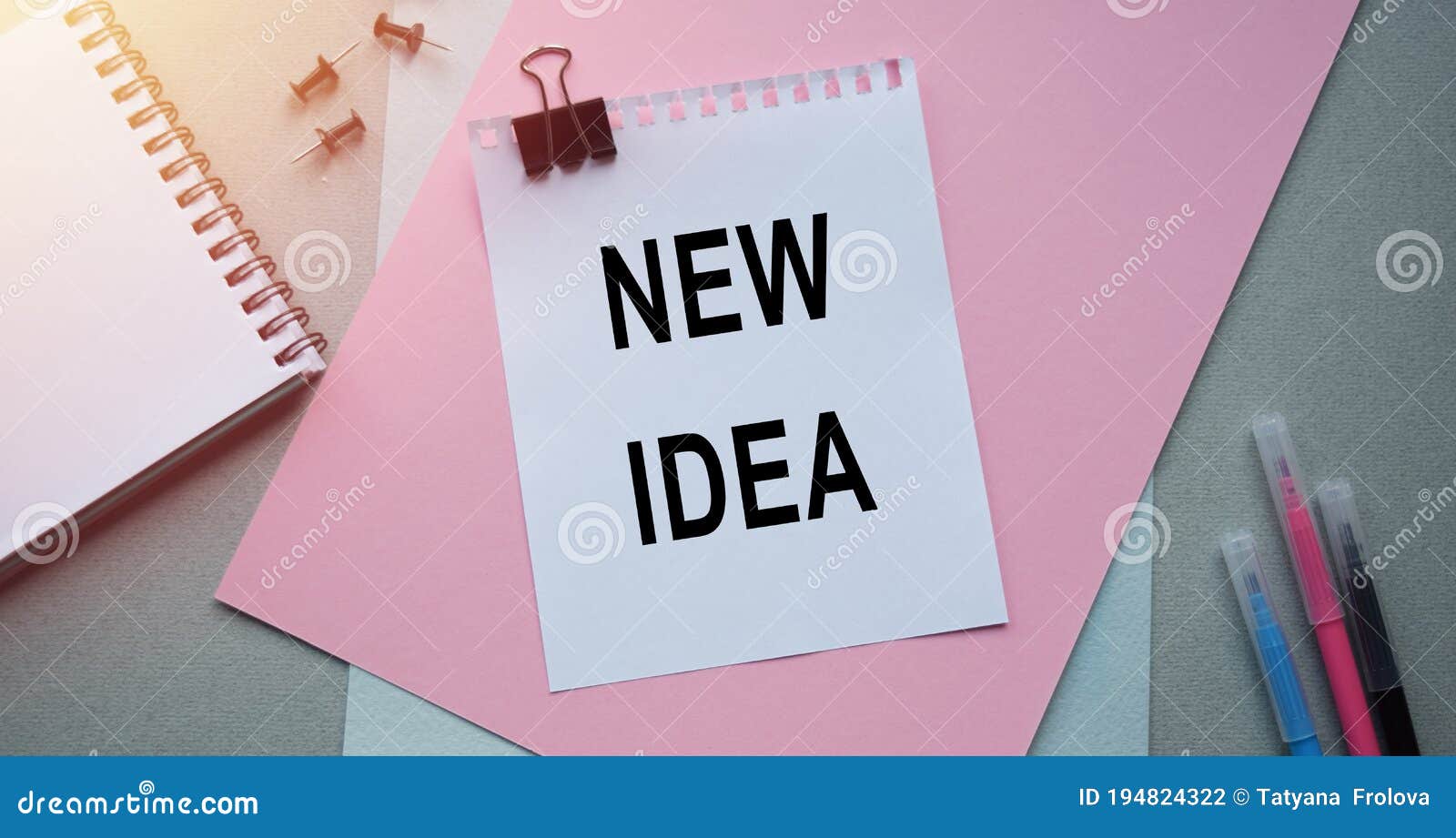 Lettering New Idea on a Sheet of Notes. Stock Photo - Image of ...