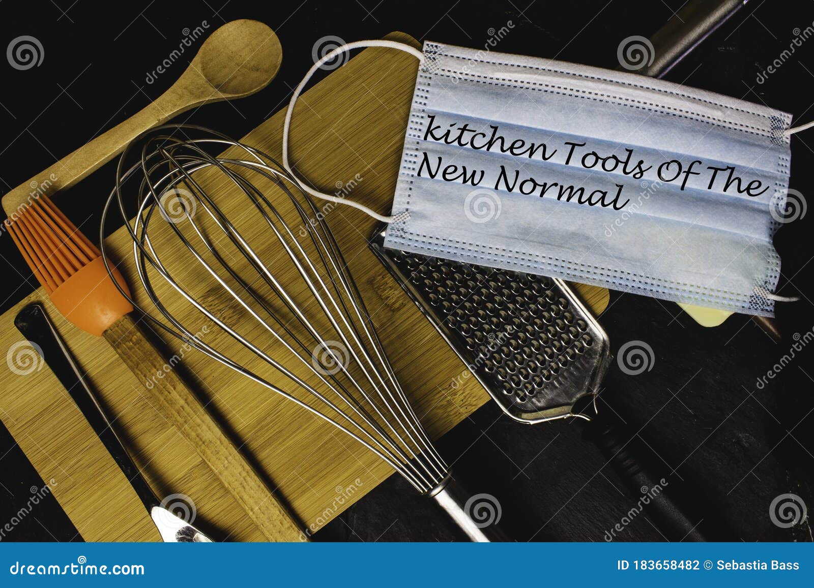 Lettering of the New Normal on Kitchen Utensils and Tools. Face Mask in ...