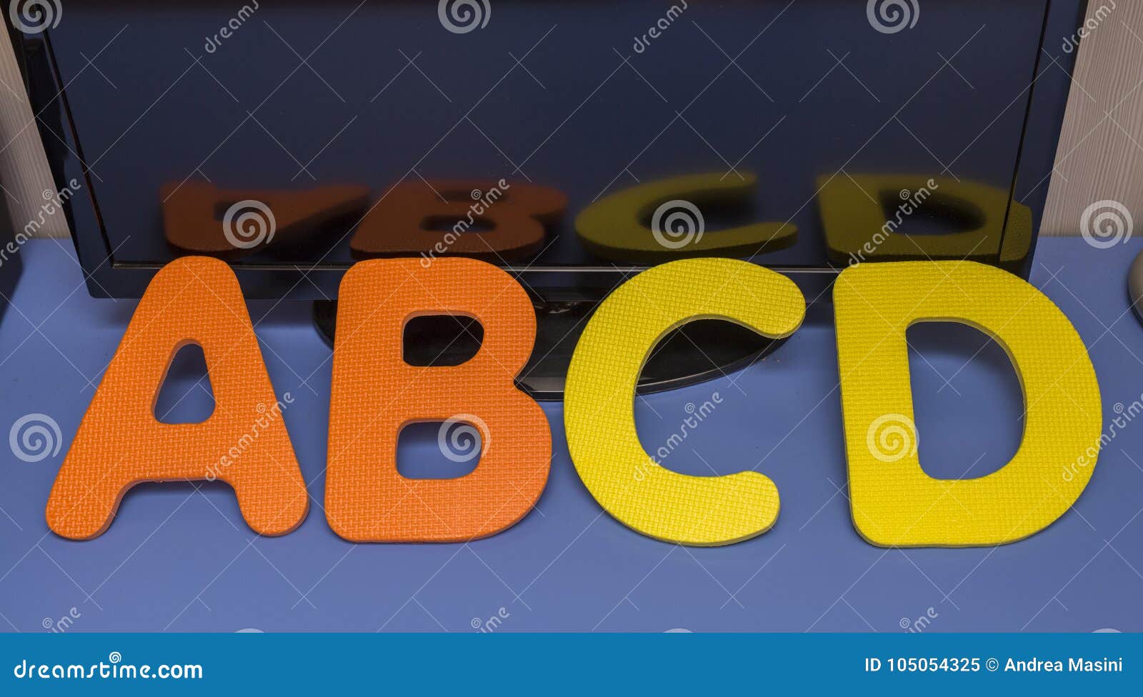 Letters of the Alphabet a B C D on Table with-reflection-2 Stock Image ...