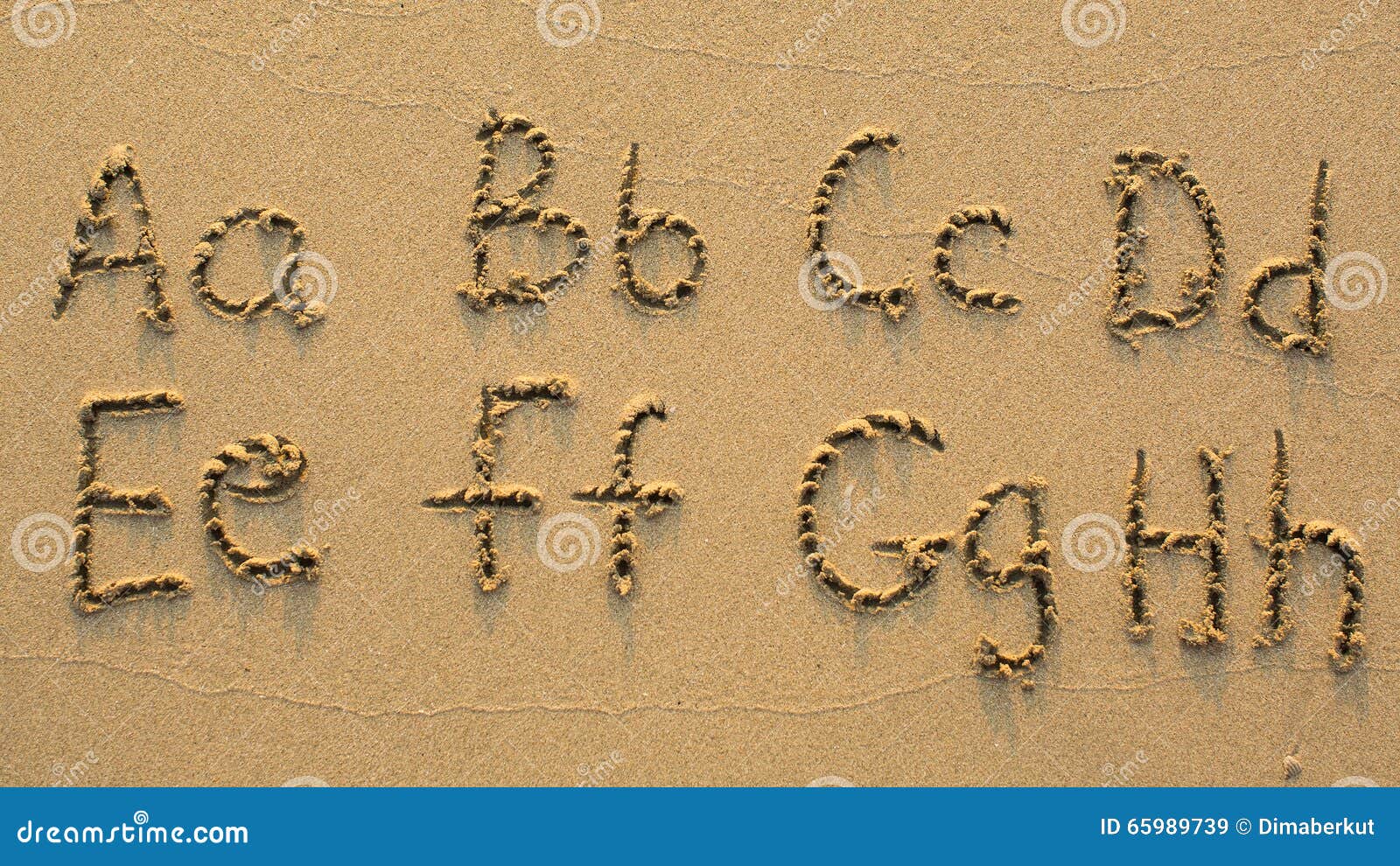 Letters Of The Alphabet Written On Sandy Beach Stock Image - Image of ...