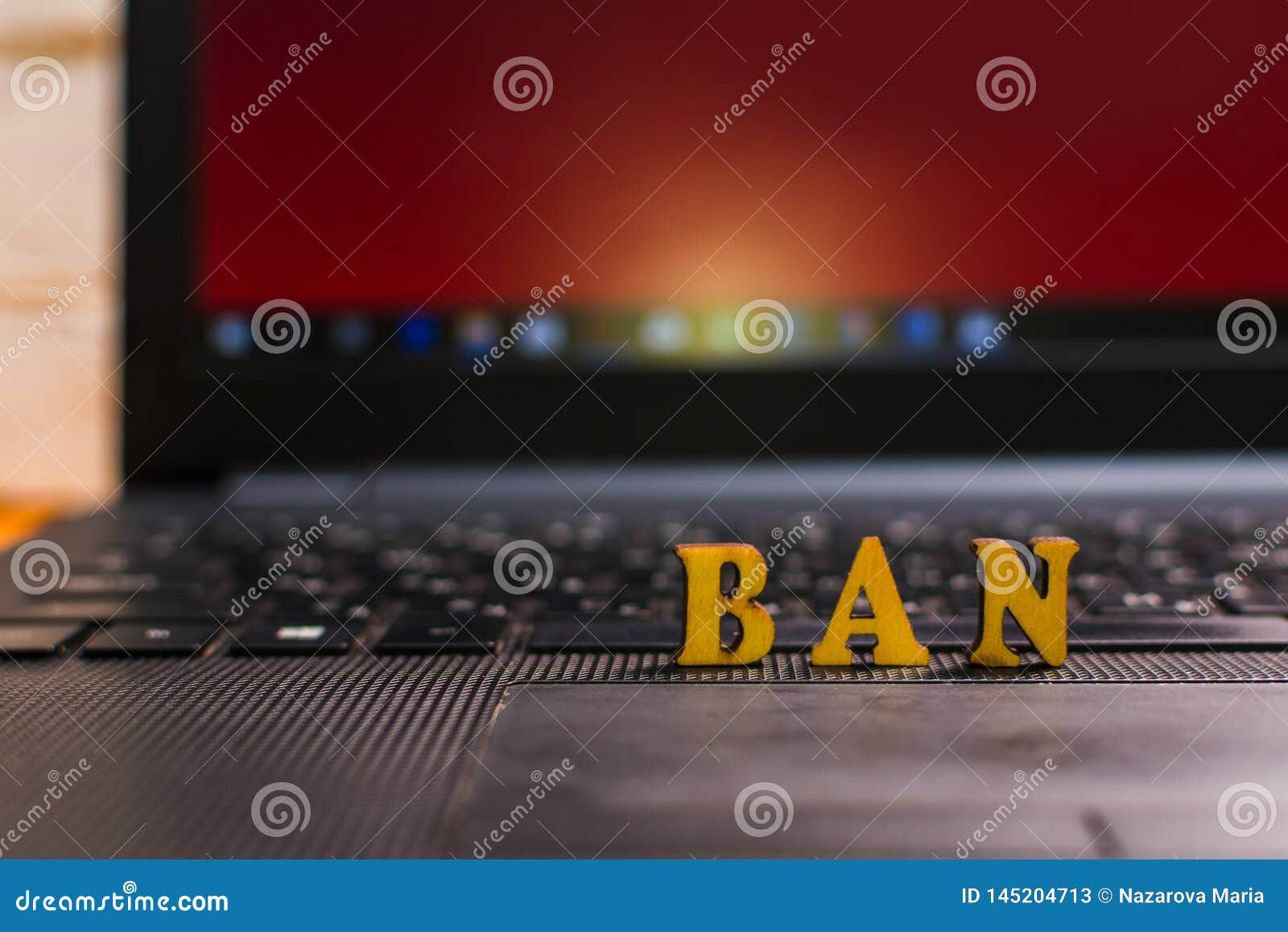 Letters BAN on the Laptop Keyboard Stock Image - Image of wooden ...