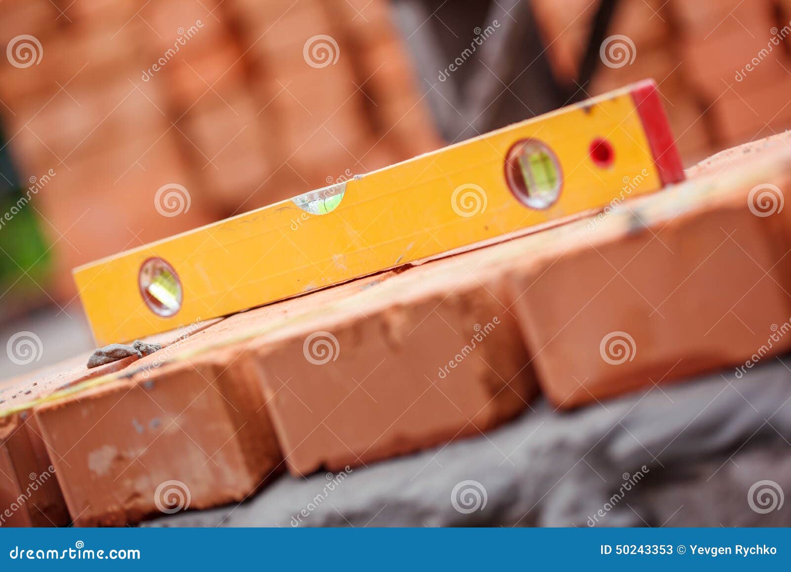 Level on bricks stock image. Image of bricklayer, service - 50243353