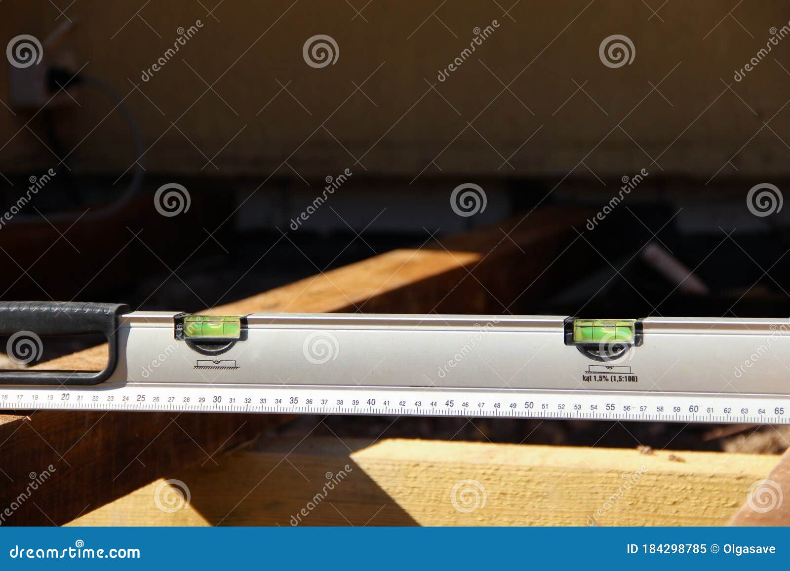 Level Check of Wooden Beam. Building Level in Use Stock Image - Image ...
