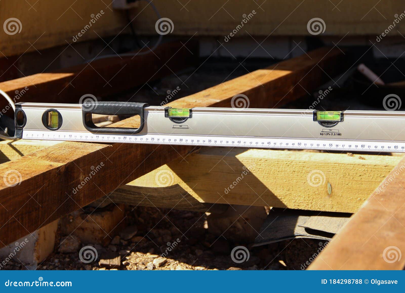 Level Check of Wooden Beam. Building Level in Use Stock Photo - Image ...