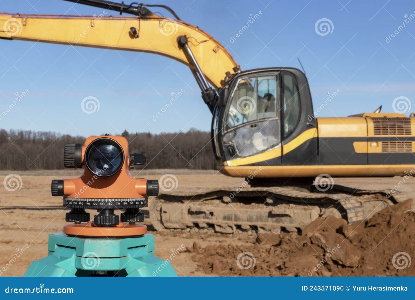 Level With An Excavator In The Background. Construction Level Or ...