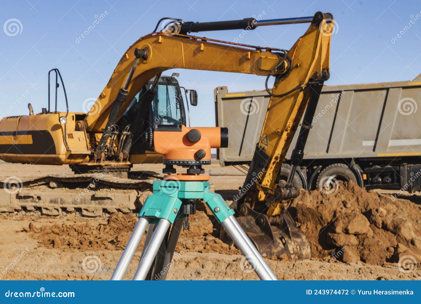 Level With An Excavator In The Background. Construction Level Or ...