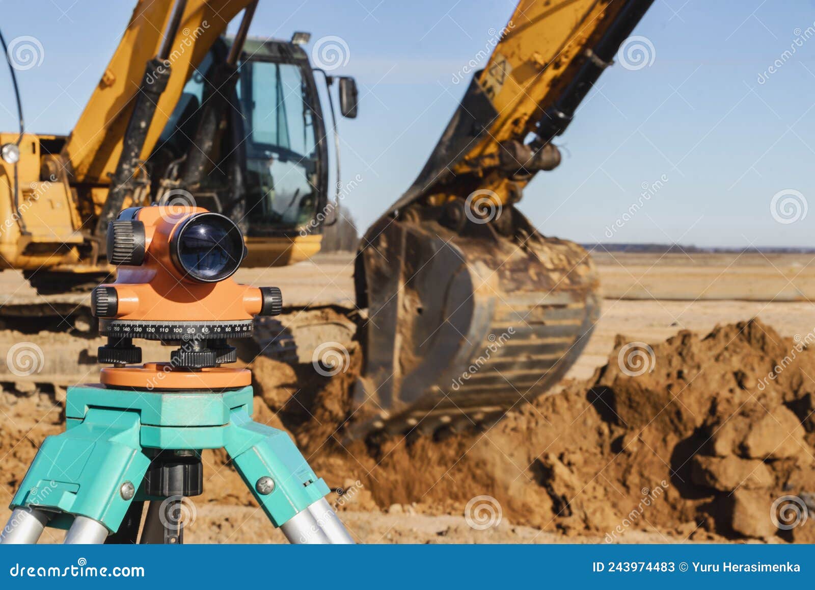 Level with an Excavator in the Background. Construction Level or ...