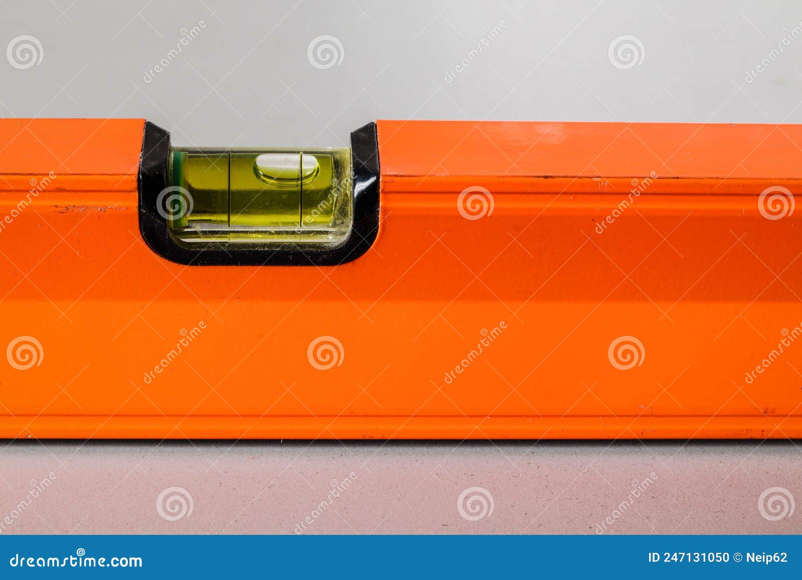 Level on a Sloping Surface. Bubble Level Indicates the Slope of the ...