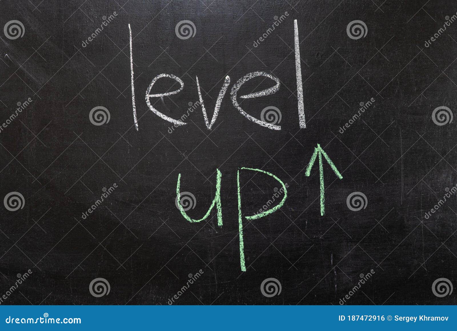 LEVEL UP Text on a Chalkboard, the Concept of Raising the Level Stock ...