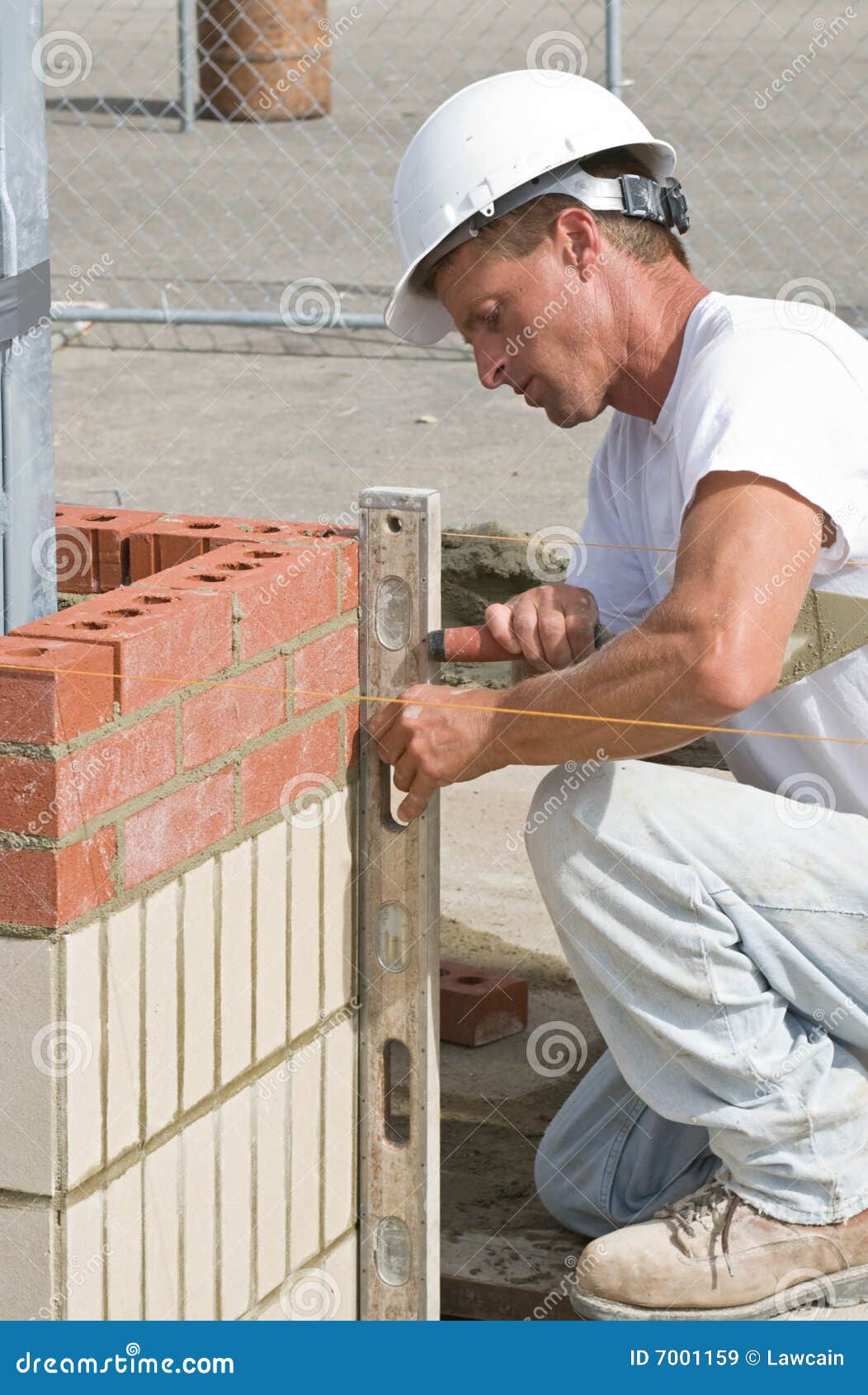 Leveling Bricks stock image. Image of laborer, inspecting - 7001159