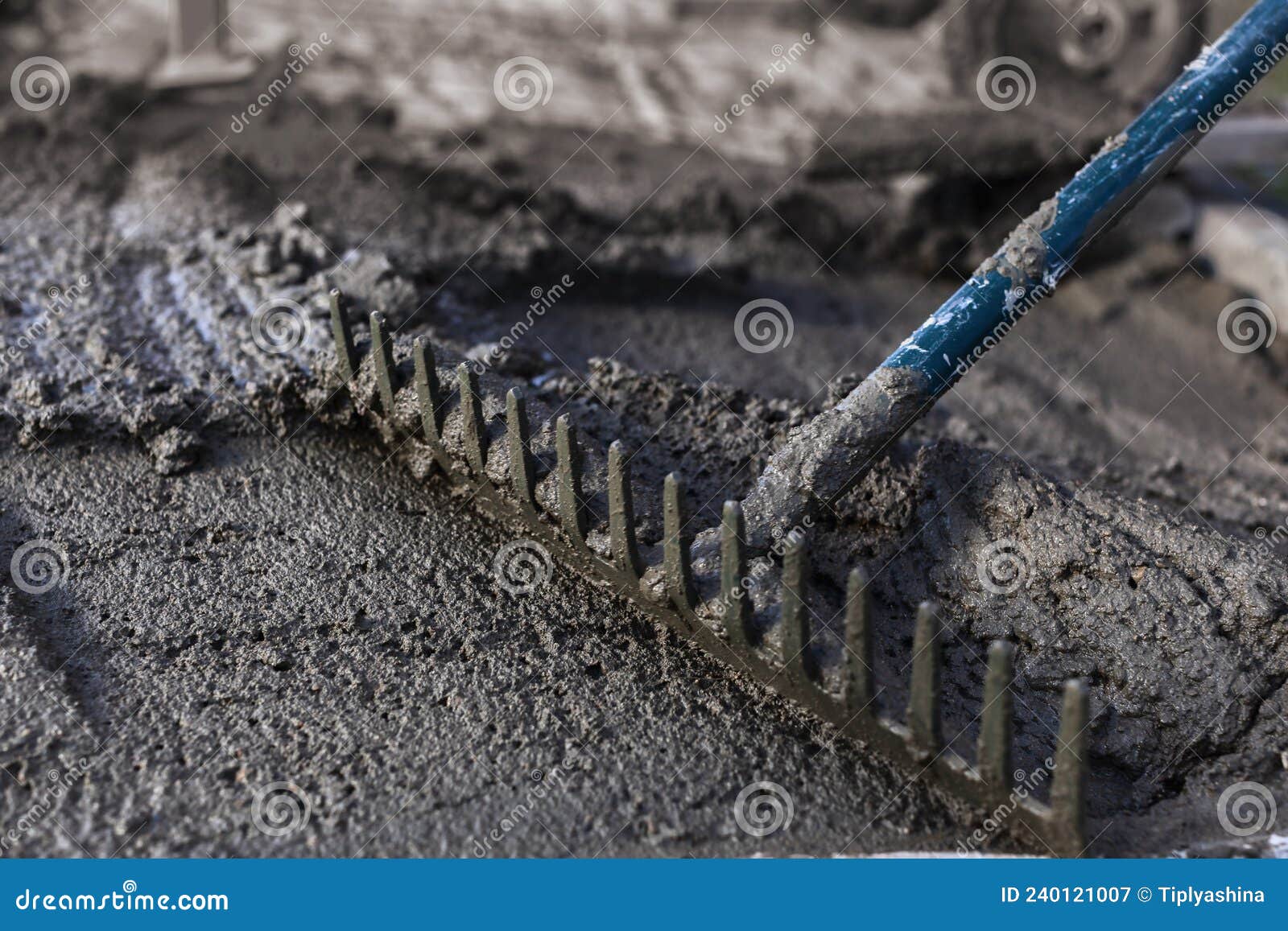 Leveling the Concrete Solution with a Rake Along the Track Stock Image ...