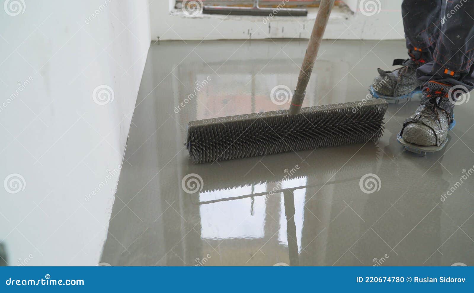 Leveling the Floor Using Spiked Roller in Empty Room. Roll Out the Self ...