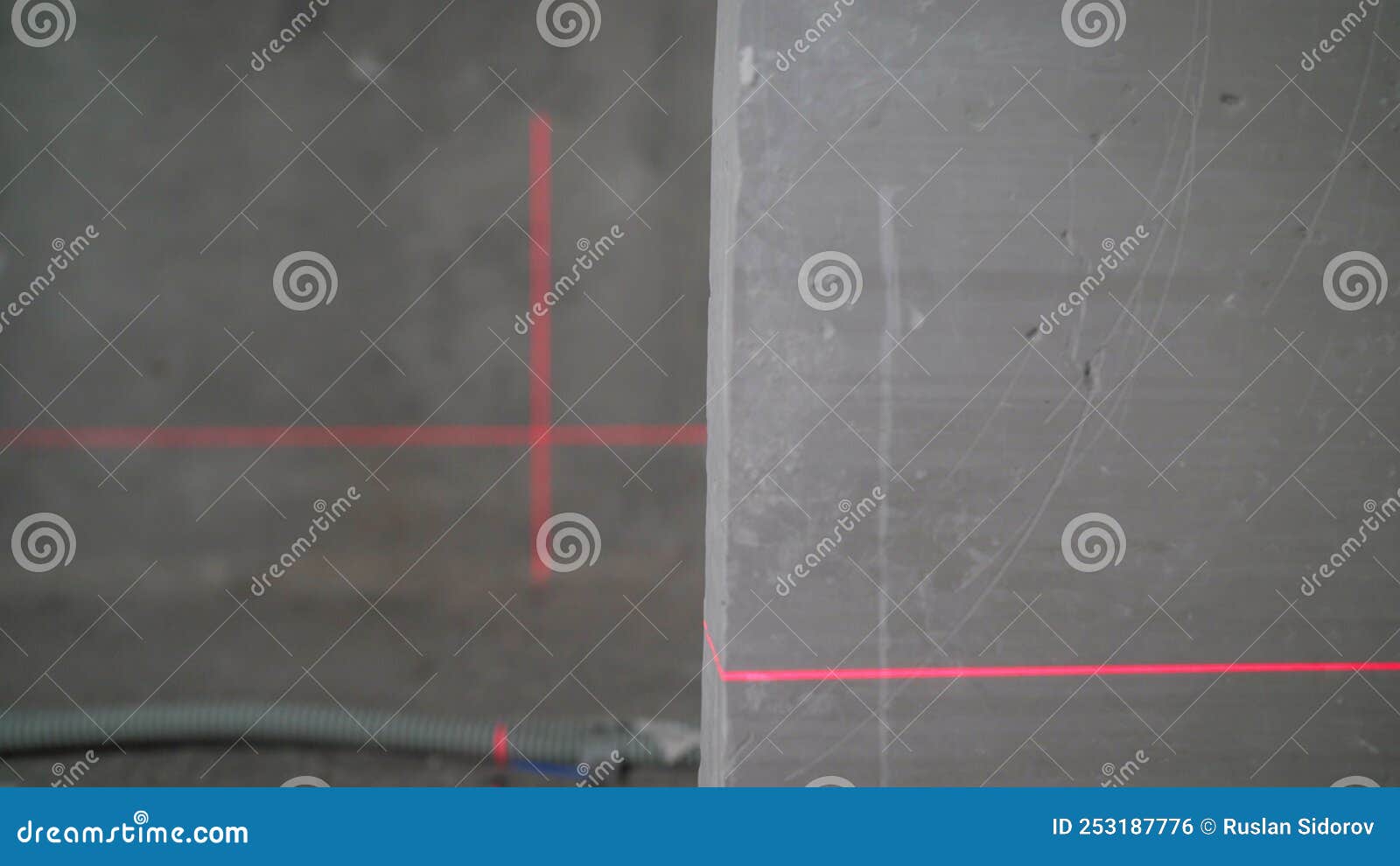 Leveling the Wall with a Laser Level. Lighted Laser Level. Display ...