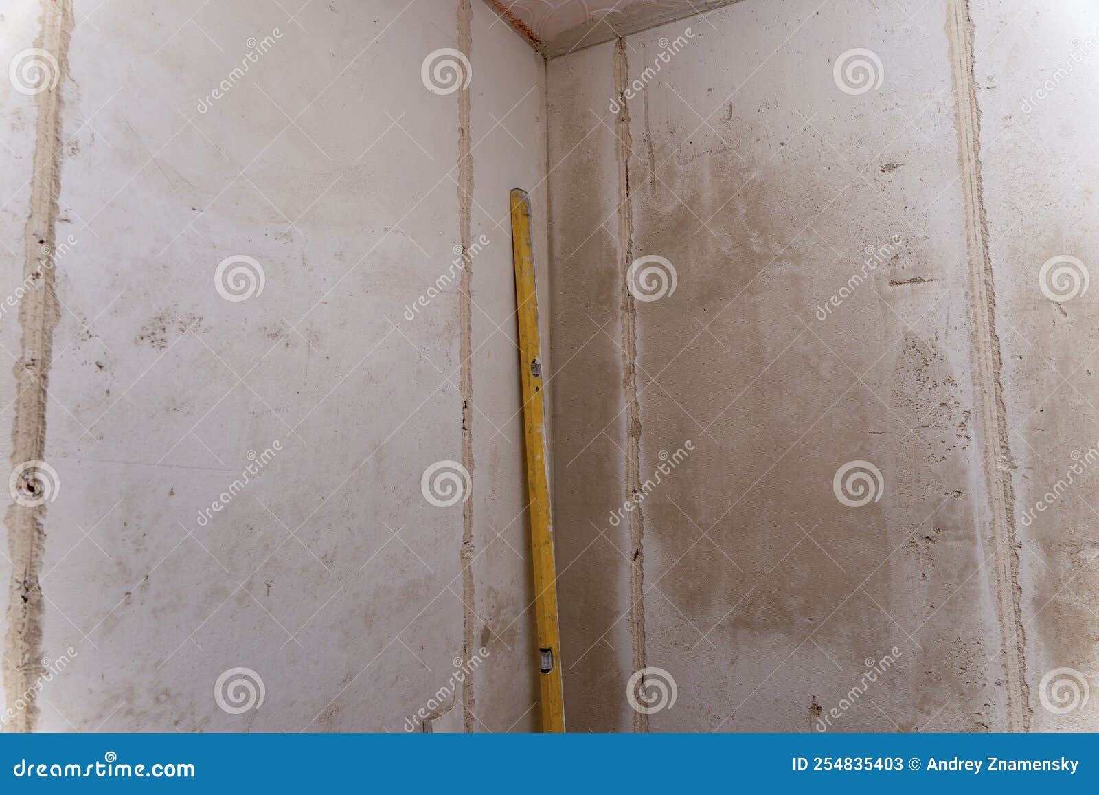 Leveling the Walls with Plaster Using Lighthouses. Stock Image - Image ...