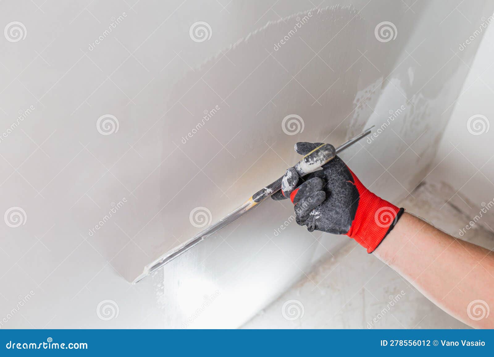 Leveling the Walls with White Putty Stock Photo - Image of building ...