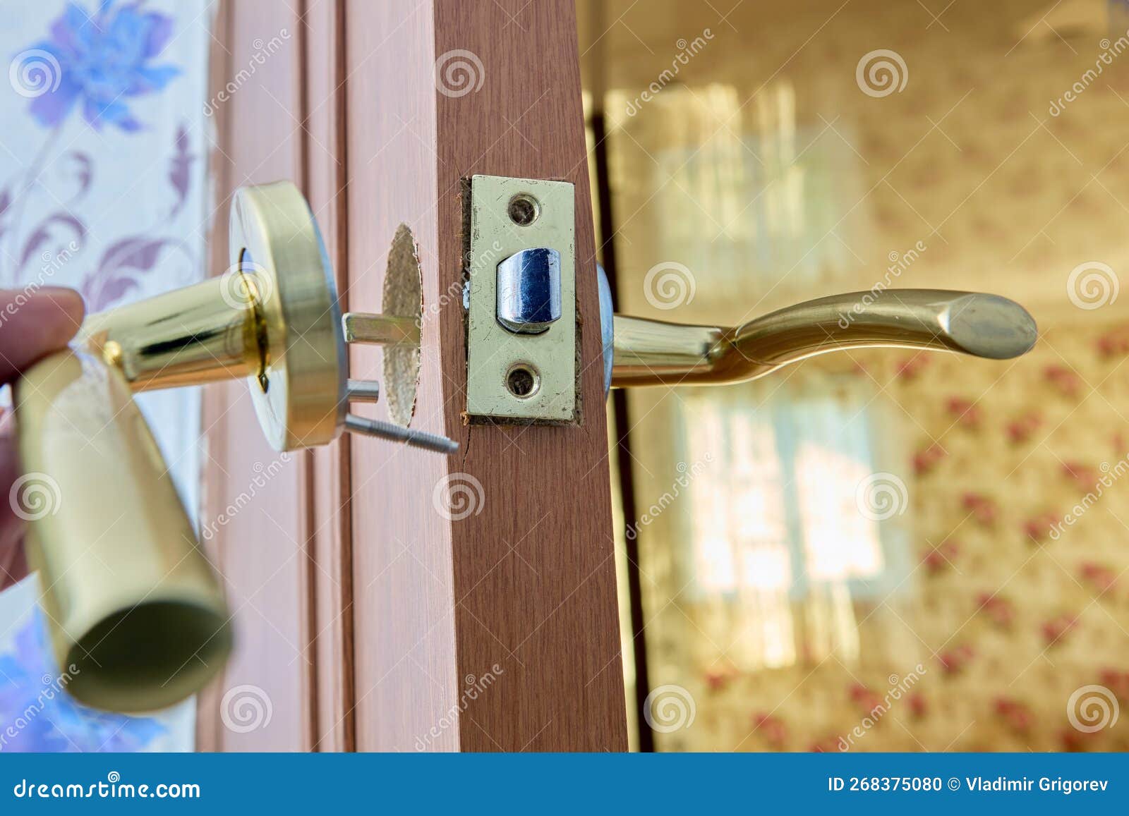 Alignment of Lever Door Handle with Latch during Installation. Stock ...