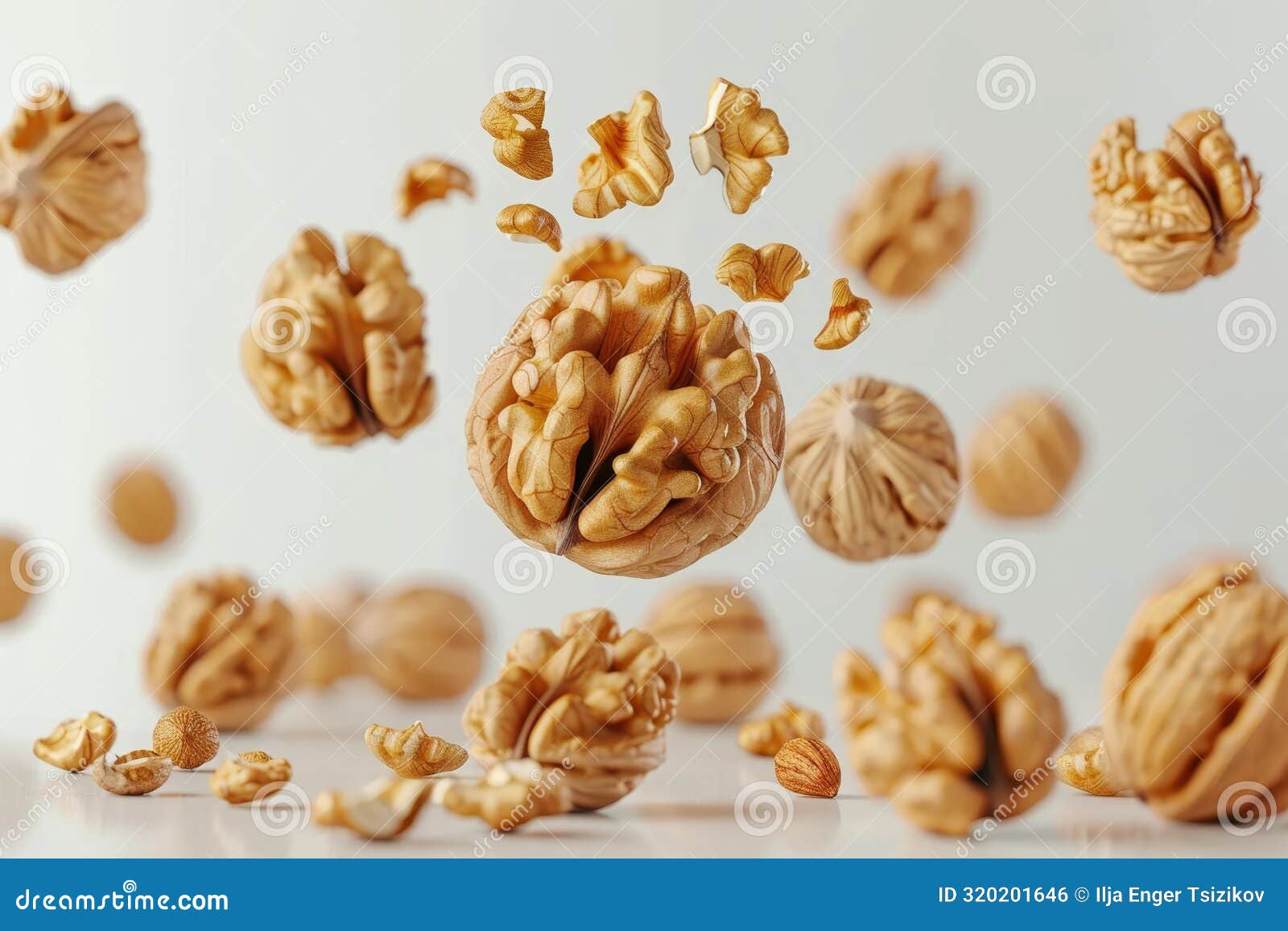 Levitating Nuts Falling in Mid Air Against a White Background ...