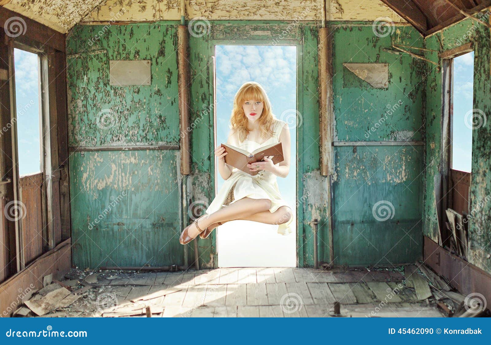 Levitating Redhead Woman with Book Stock Photo - Image of gorgeous ...