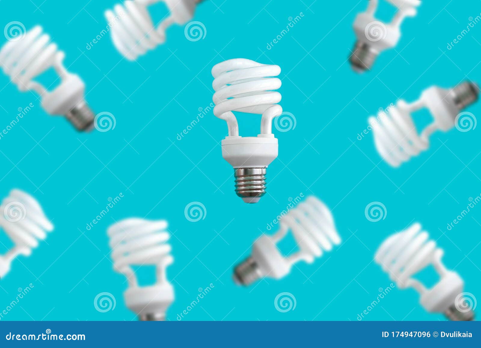 Levitating Energy Saving Light Bulbs on Blue Background, Energy Saving ...
