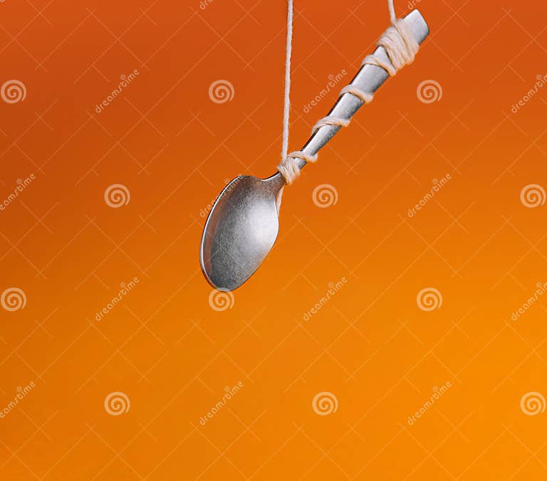 Levitating Spoon on Orange Background Stock Photo - Image of kitchen ...