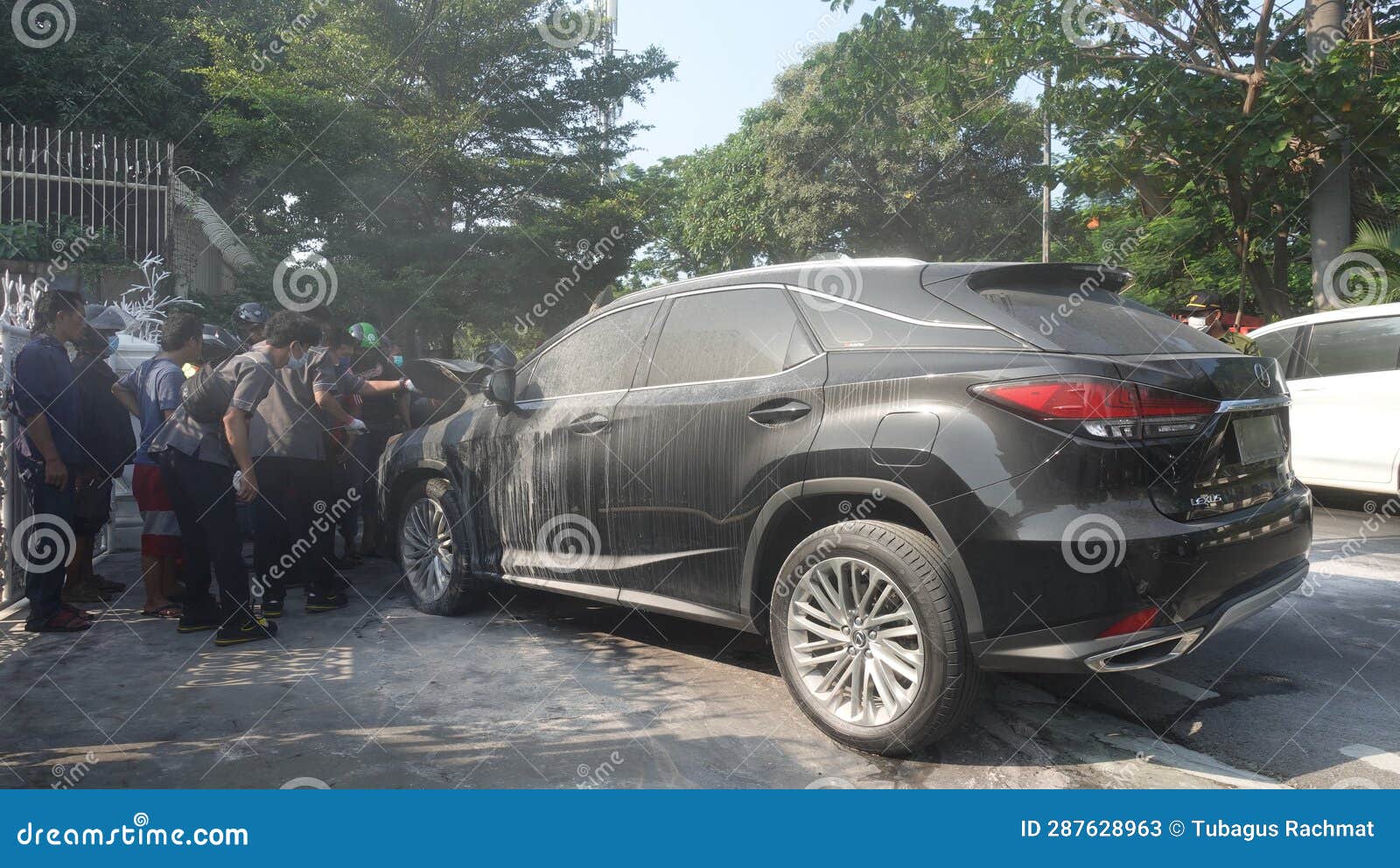 A Lexus car caught fire editorial stock photo. Image of extinguisher ...
