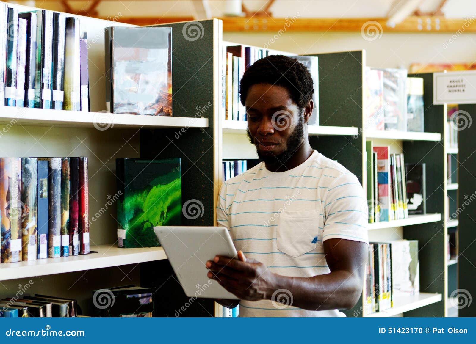 Librarian Checking Inventory on Tablet Stock Photo - Image of holding ...
