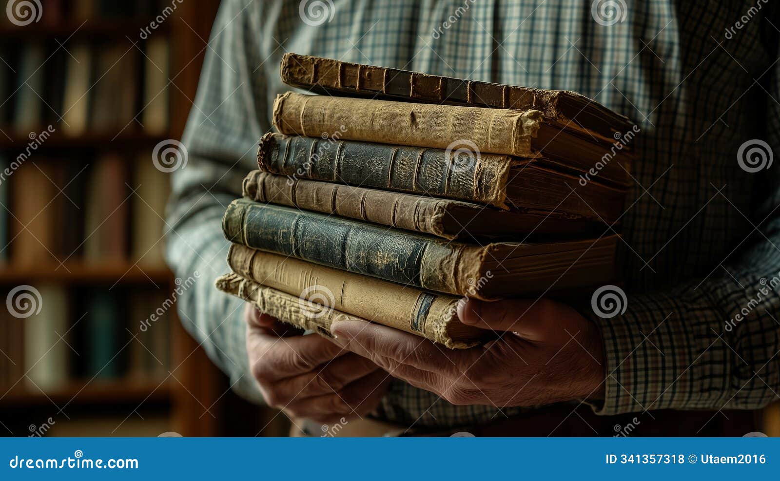 Librarian Holding a Stack of Antique Books Stock Photo - Image of ...