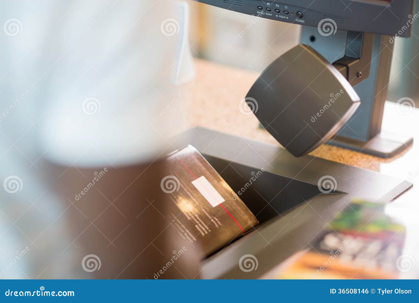 Librarian Scanning Books at Library Counter Stock Photo - Image of ...