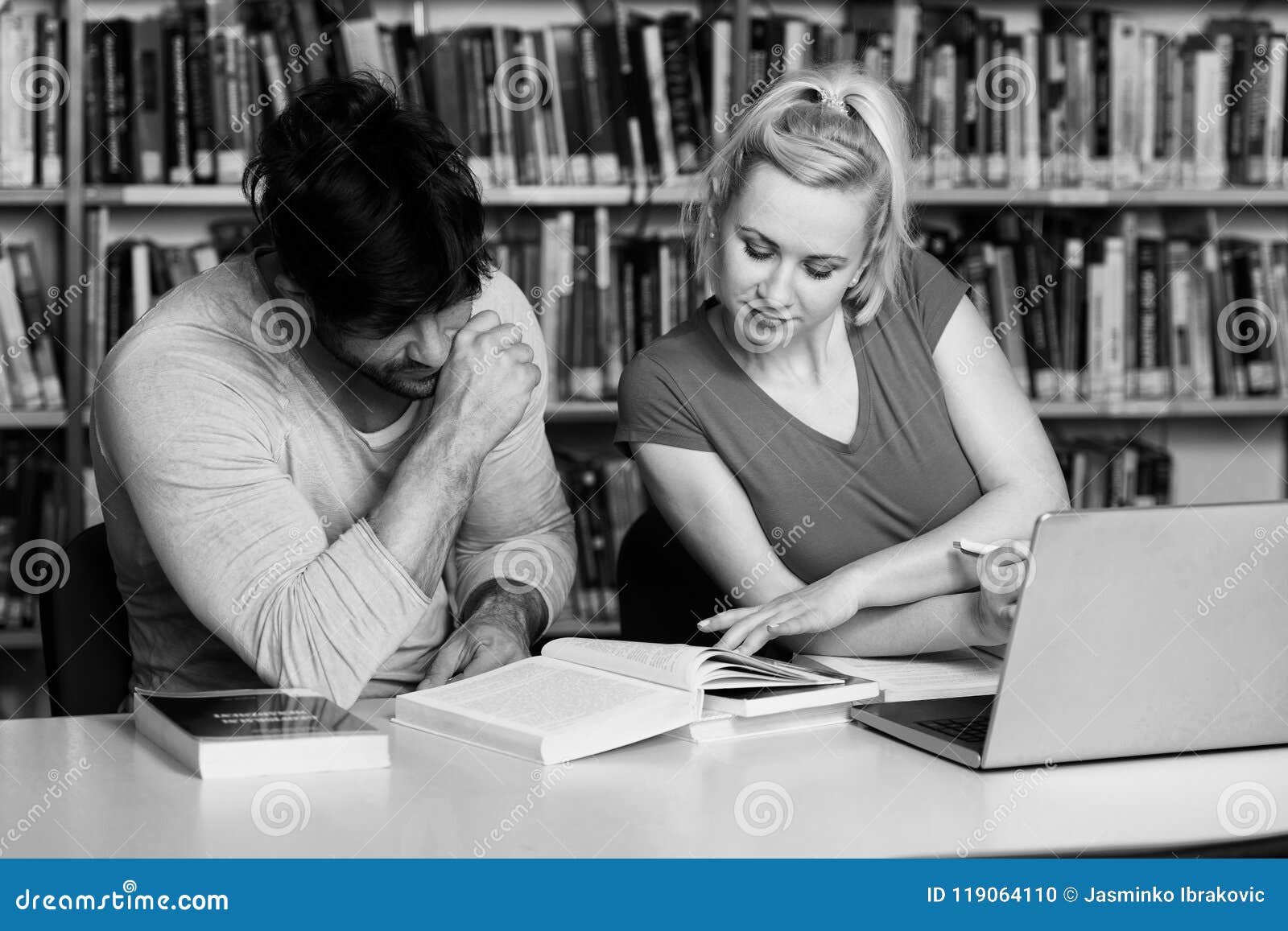 Students Using a Tablet Computer in a Library Stock Photo - Image of ...