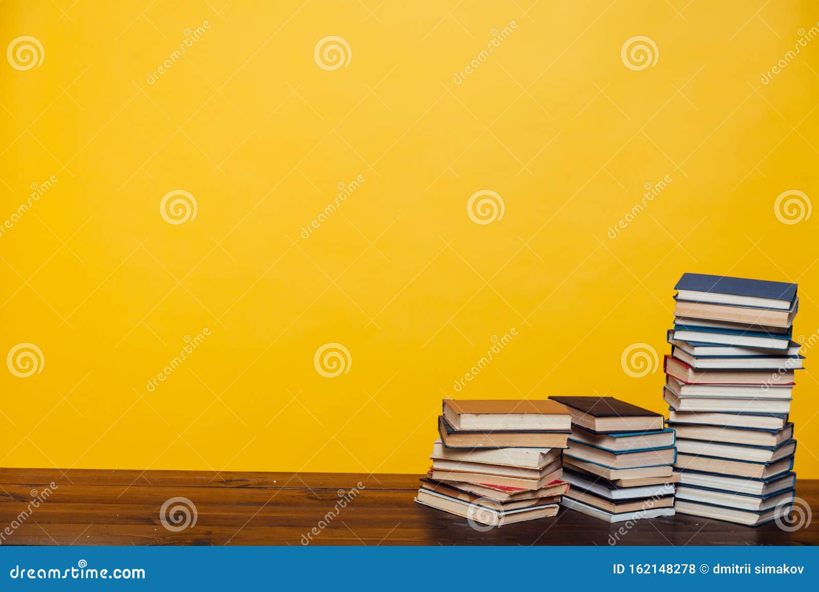 Library of Many Books for Learning on a Yellow Background Stock Photo ...
