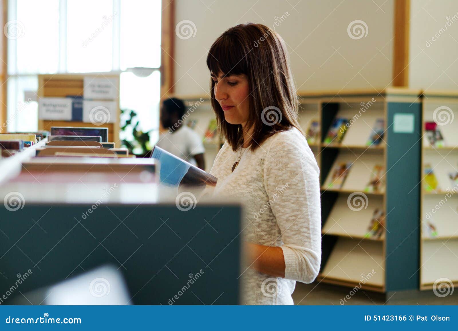 Library Patrons Looking at Books Stock Photo - Image of education ...