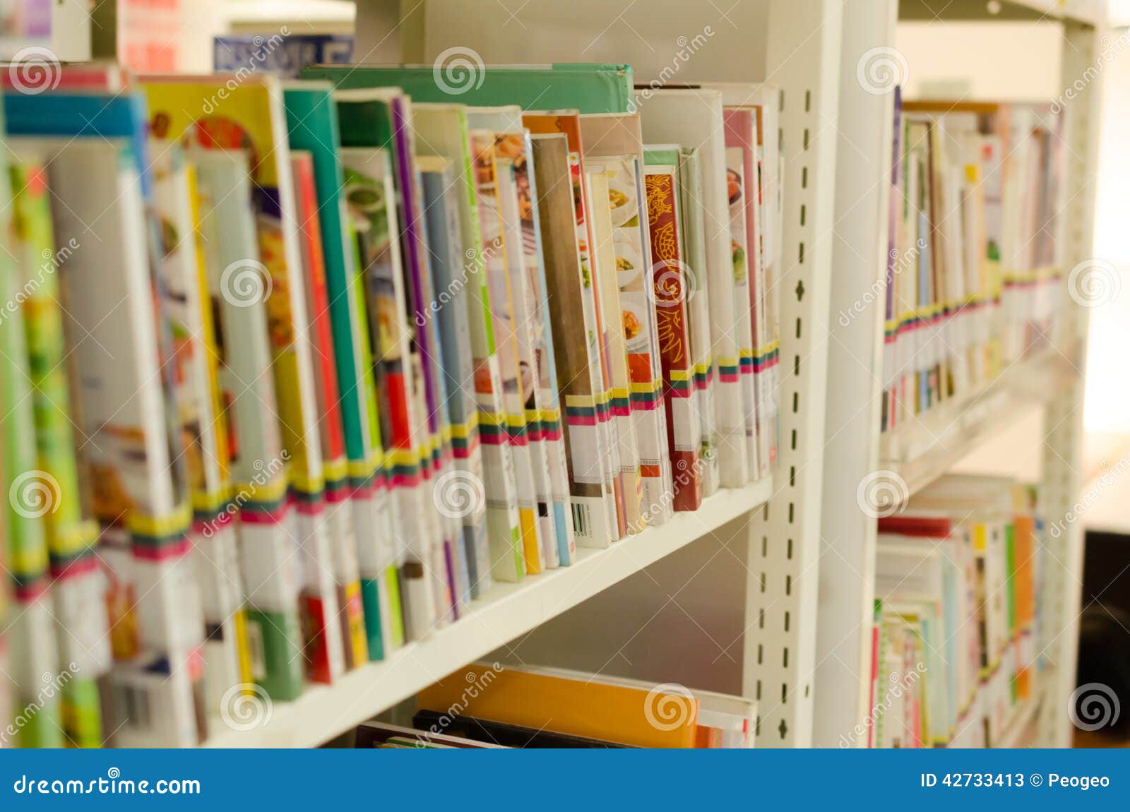 Library Setting with Books and Reading Material on Shelf Stock Image ...