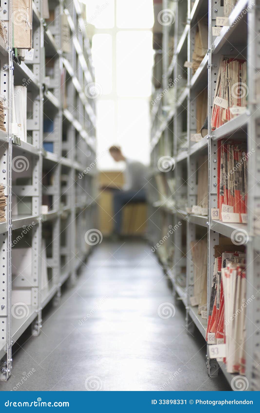 Library Shelves Full of Colour Coded Filing Stock Image - Image of ...