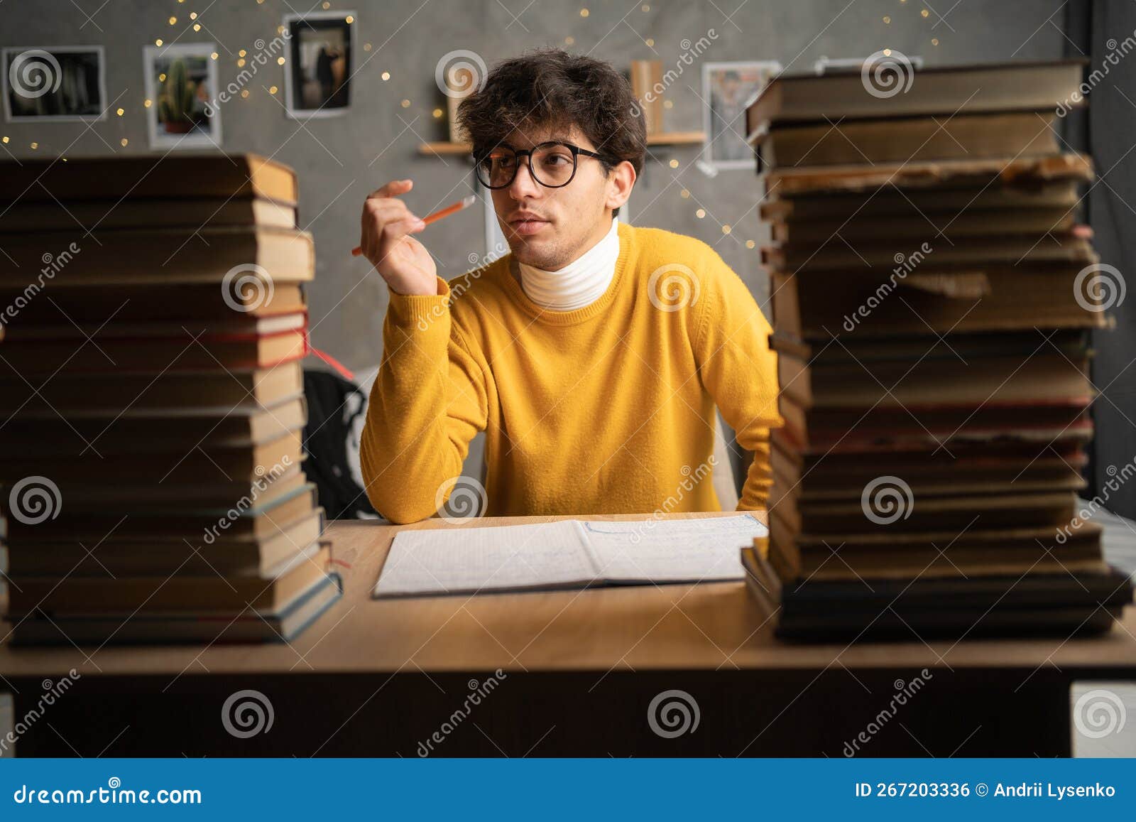 Library Study. Thinking Dreaming Thoughtful Young Man with Books in ...