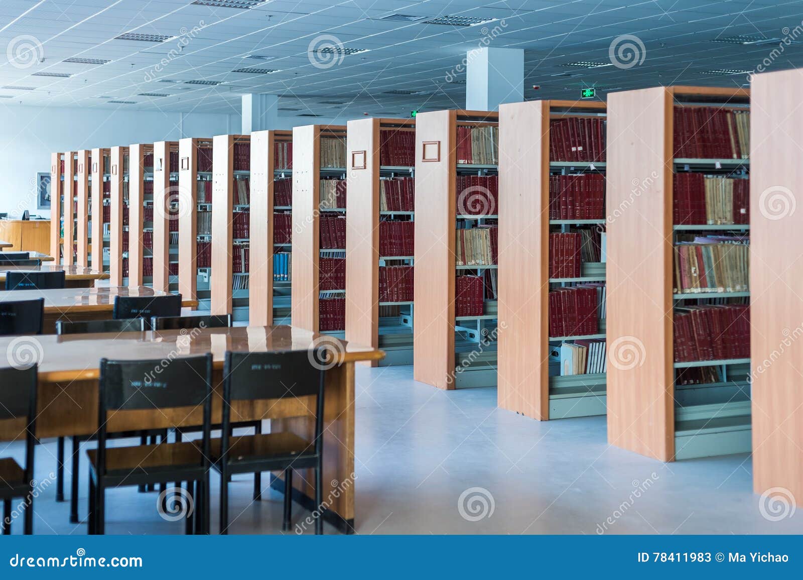 Library with Table Desk and Bookshelf Editorial Stock Photo - Image of ...