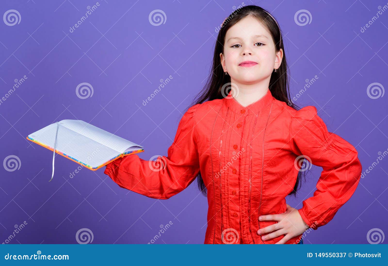 The Library is the Temple of Learning. Confident Small Child Holding ...
