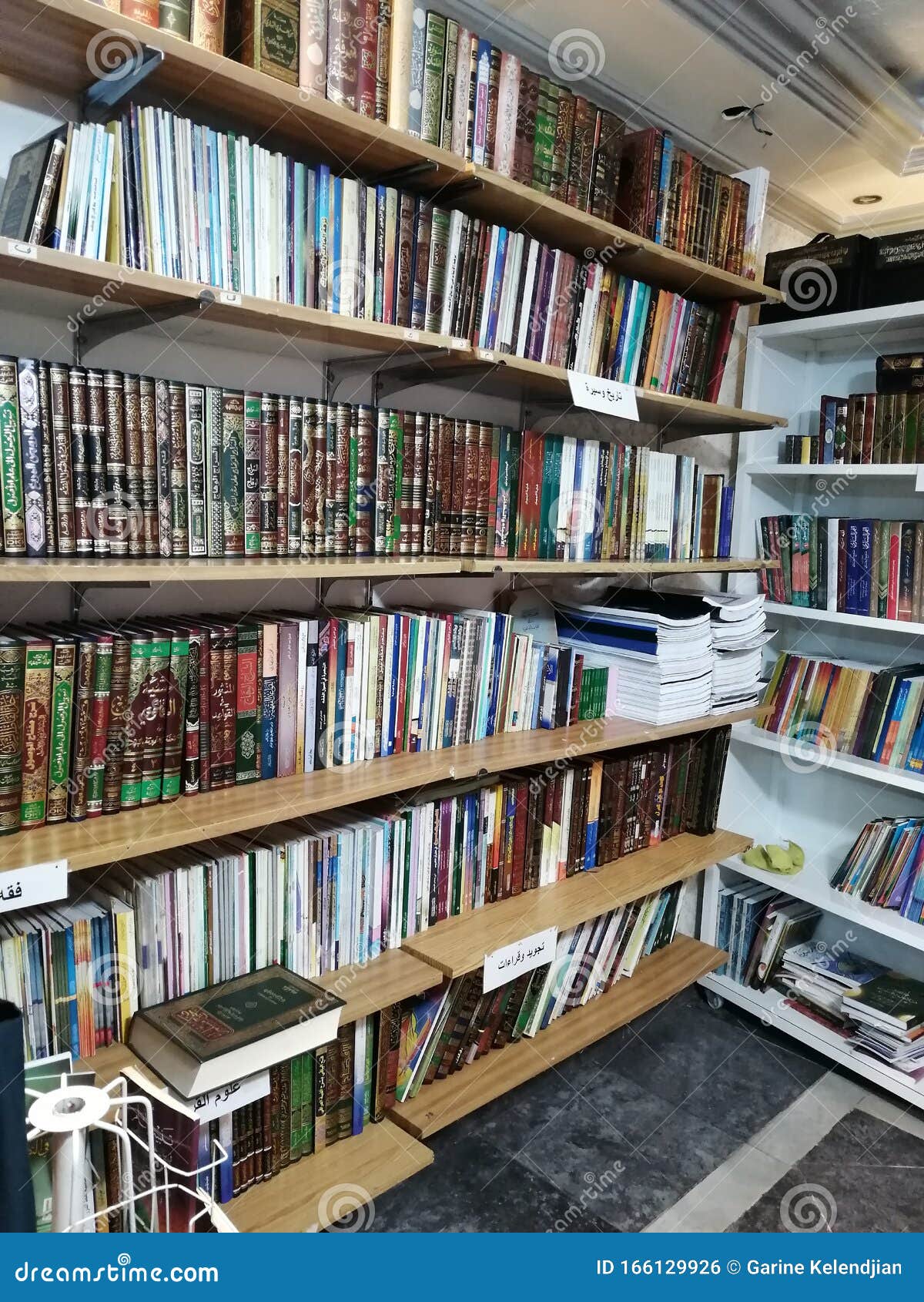 Library tidy book shelves editorial photo. Image of bookshop - 166129926