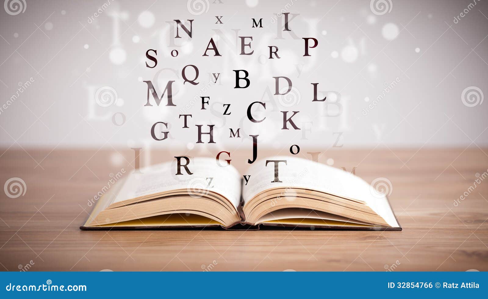 Libro Abierto Con Las Letras Del Vuelo Foto de archivo - Imagen de ...