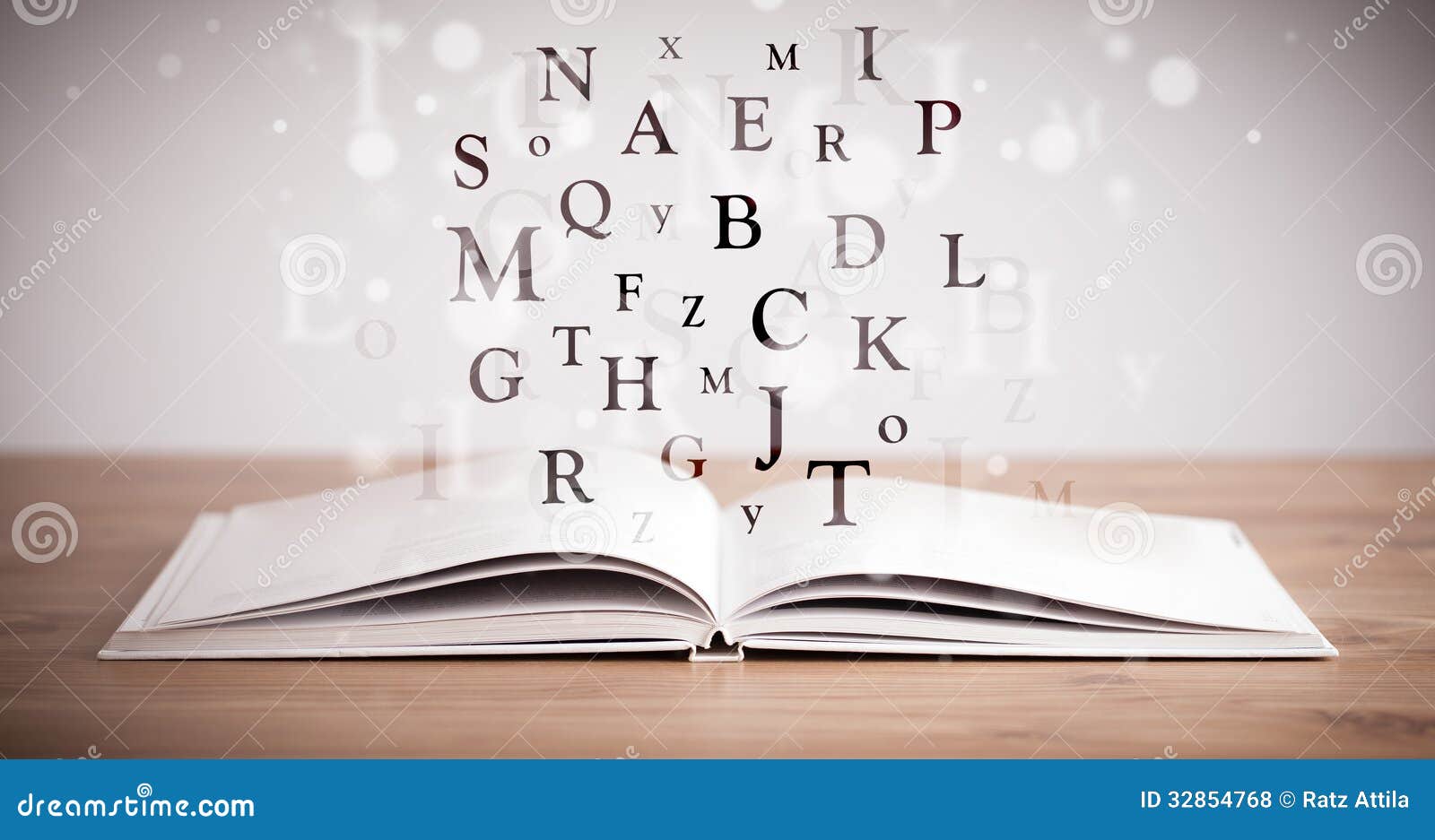 Libro Abierto Con Las Letras Del Vuelo Foto de archivo - Imagen de ...